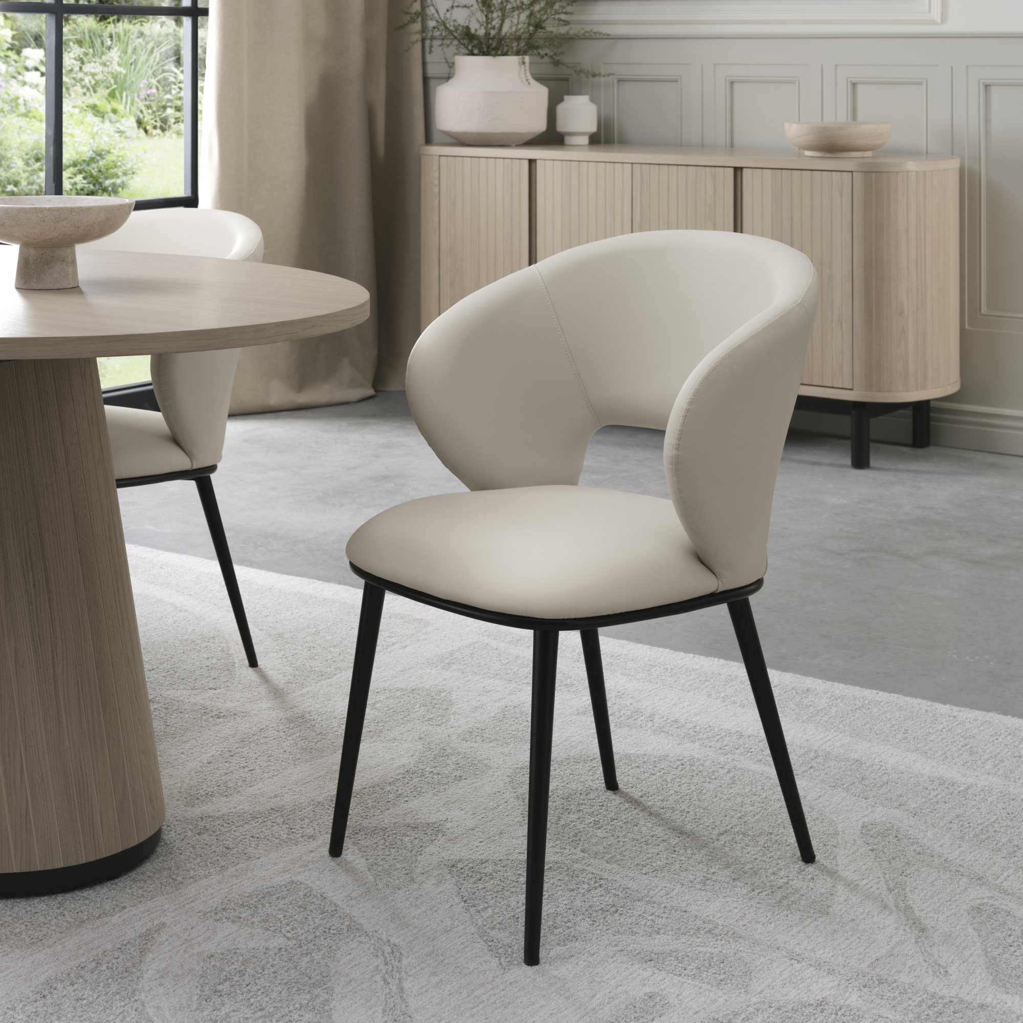 Luca - Ivory Faux Leather Scoop Dining Chairs - Bentley Designs